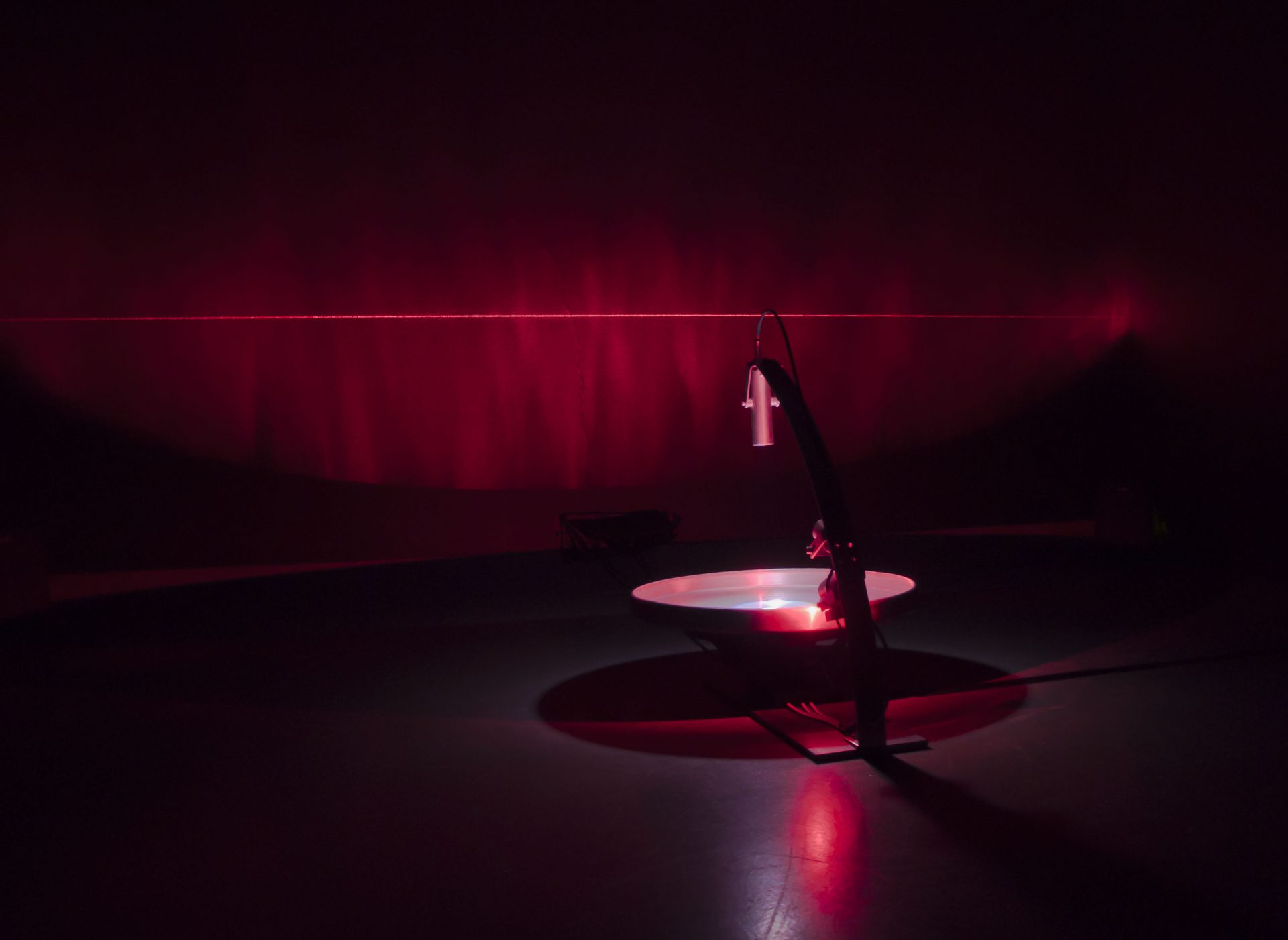 Red line border – laser cymatic installation by Jiri Suchanek